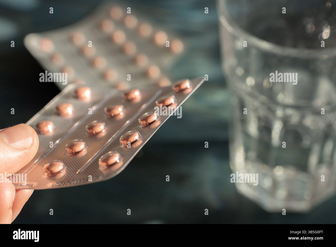 Self-medication scene with pharmaceutical drugs on blue background ...