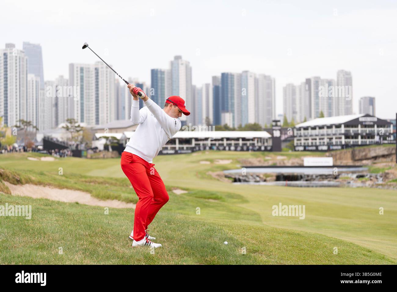 Captain Sergio Garcia of Fireballs GC hits his shot on the 18th hole ...