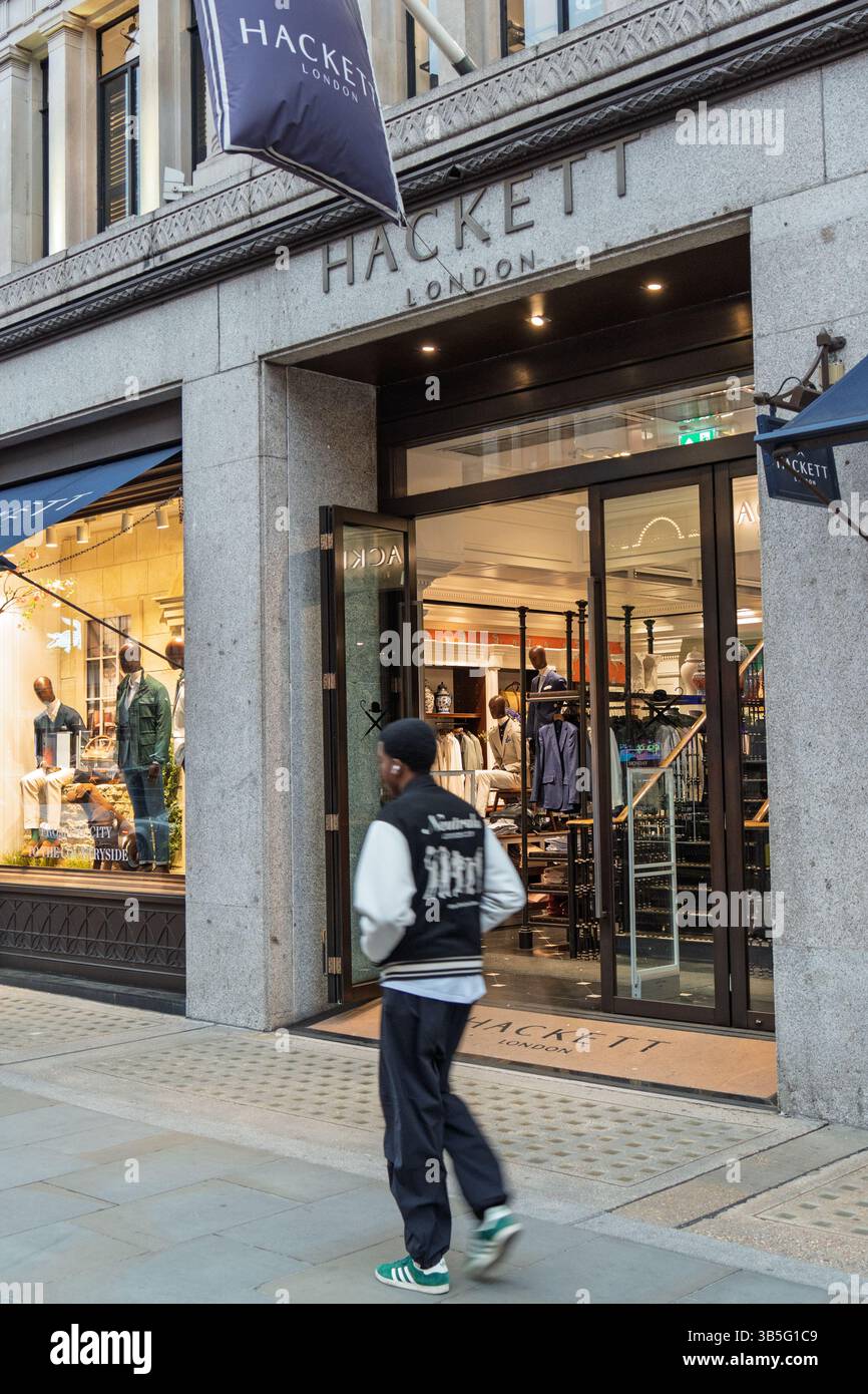 London, uk. April, 18, 2025: man walking past hackett london store on ...