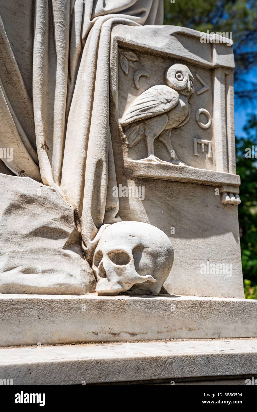 Detail of a skull at the feet of the marble statue of English poet Lord ...