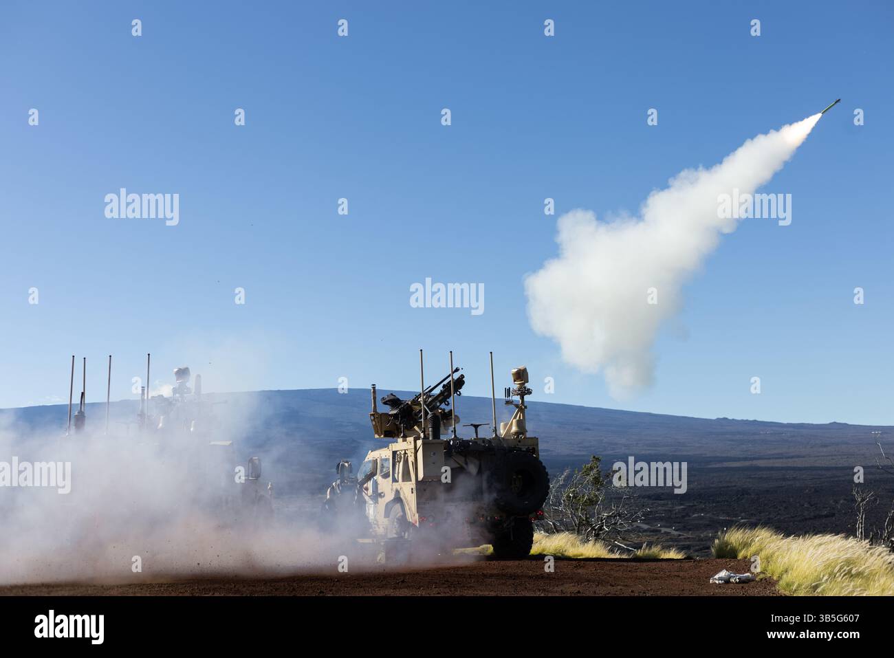 A Marine Air Defense Integrated System Mk 1 fires upon a small unmanned ...