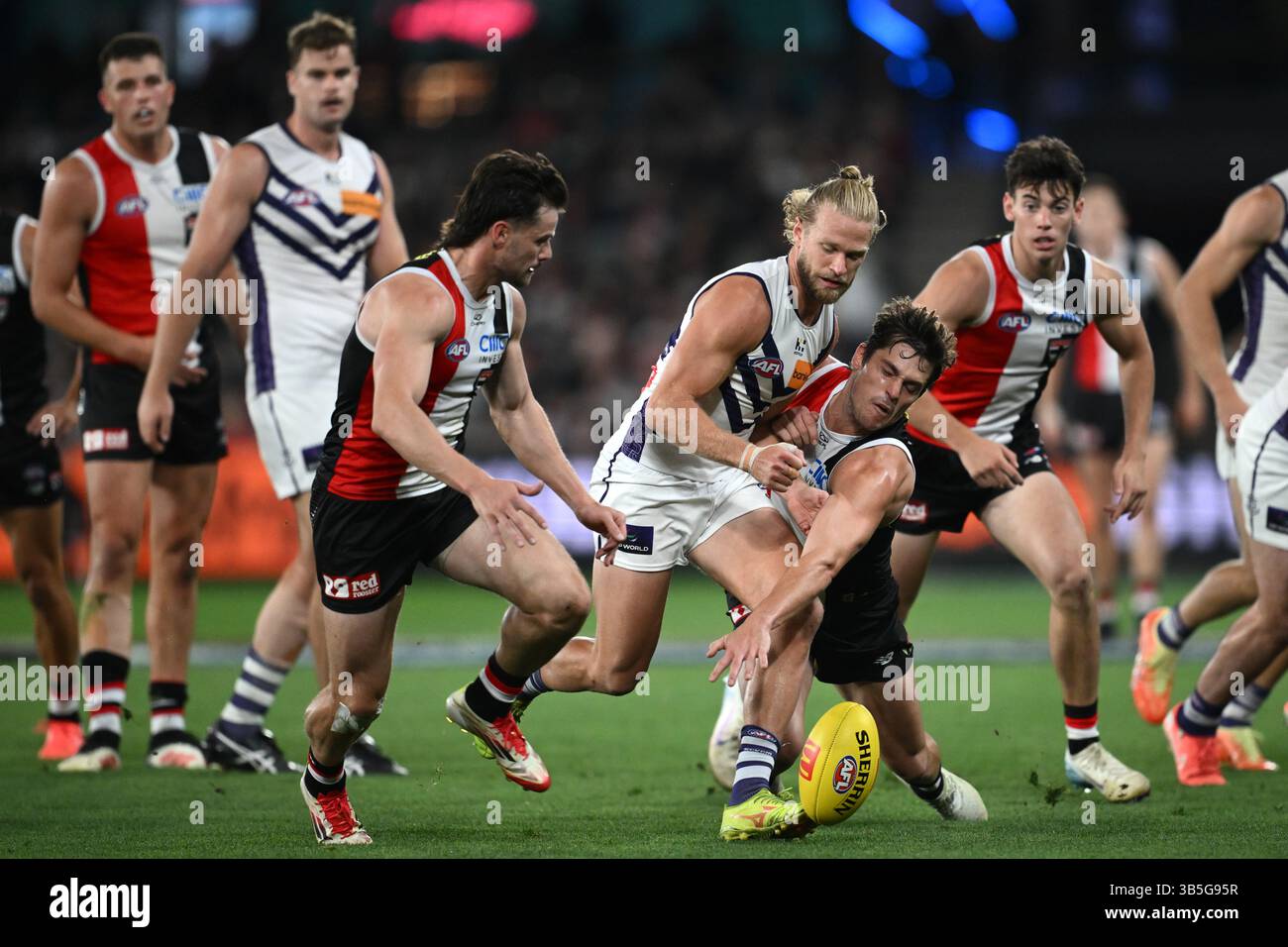 Corey Wagner of the Dockers and Jack Steele of St Kilda compete for the ...