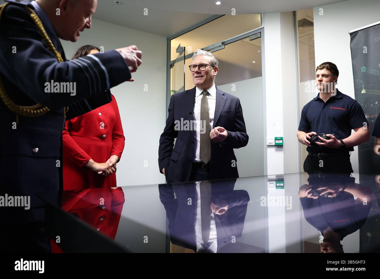 Prime Minister Sir Keir Starmer (second right) is shown an interactive ...