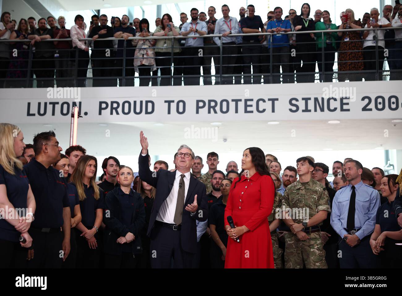 Prime Minister Sir Keir Starmer speaks to members of staff during a ...