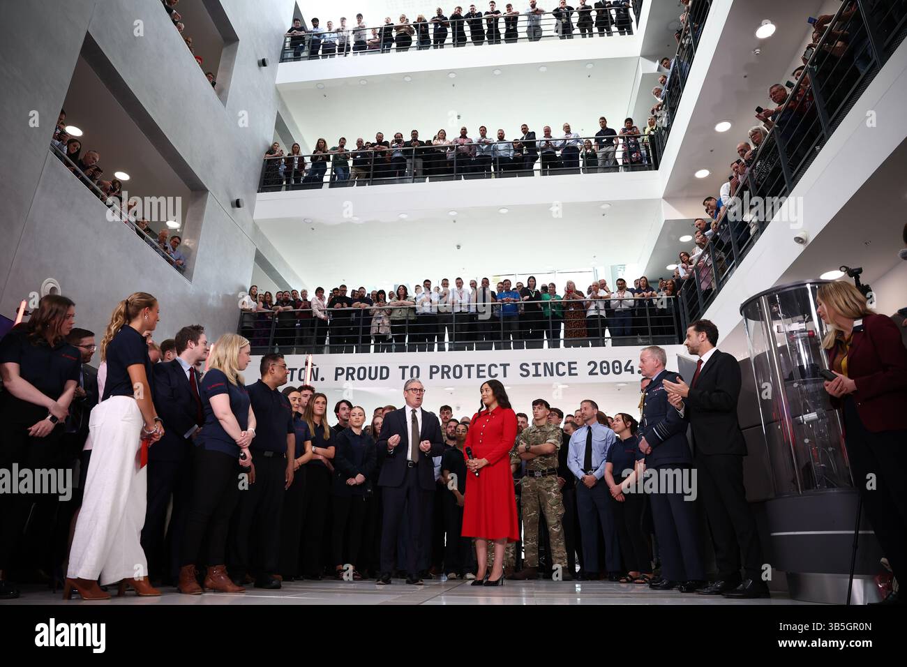 Prime Minister Sir Keir Starmer speaks to members of staff during a ...