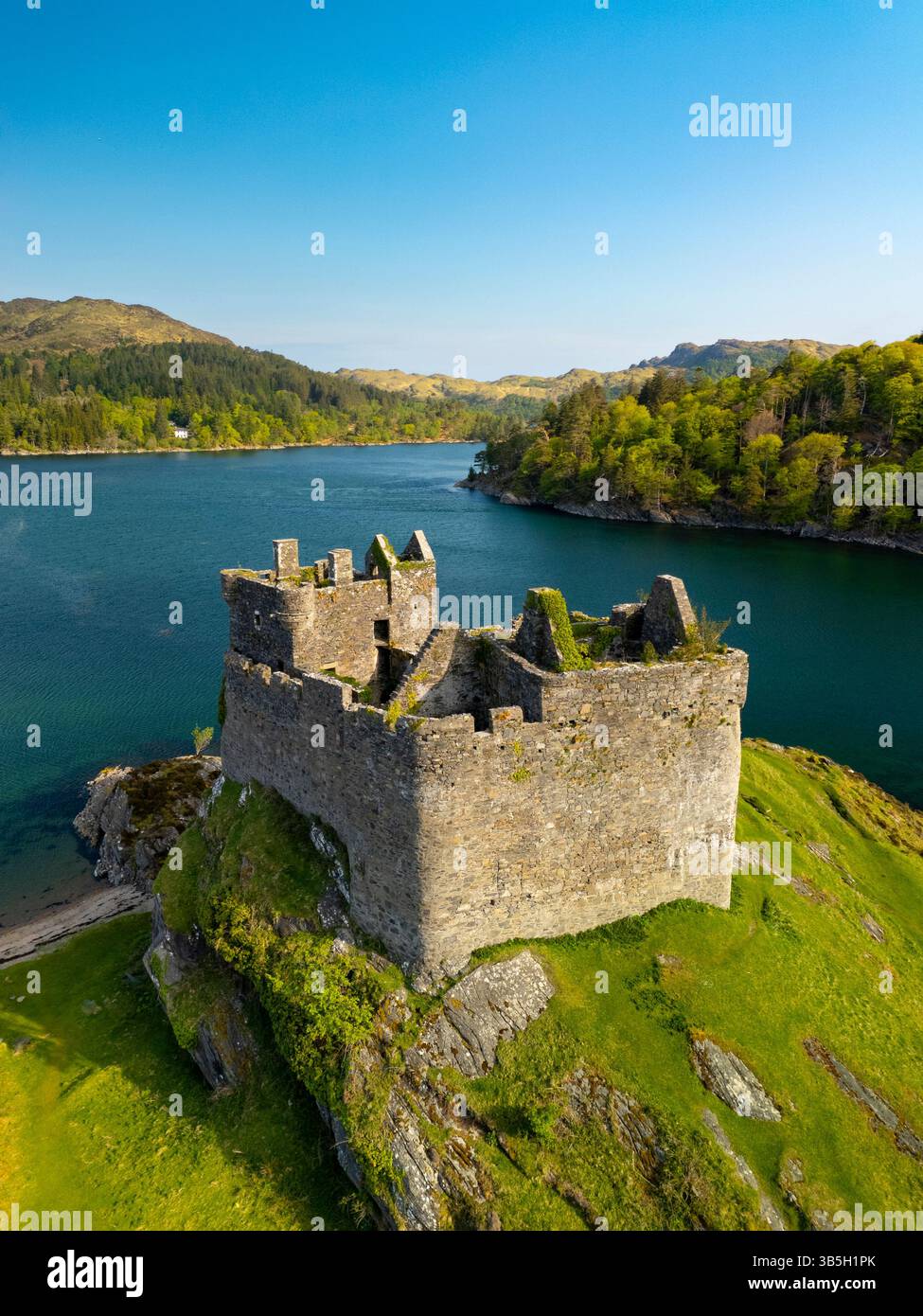 Aerial view from drone of Castle Tioram, a ruined castle on the tidal ...