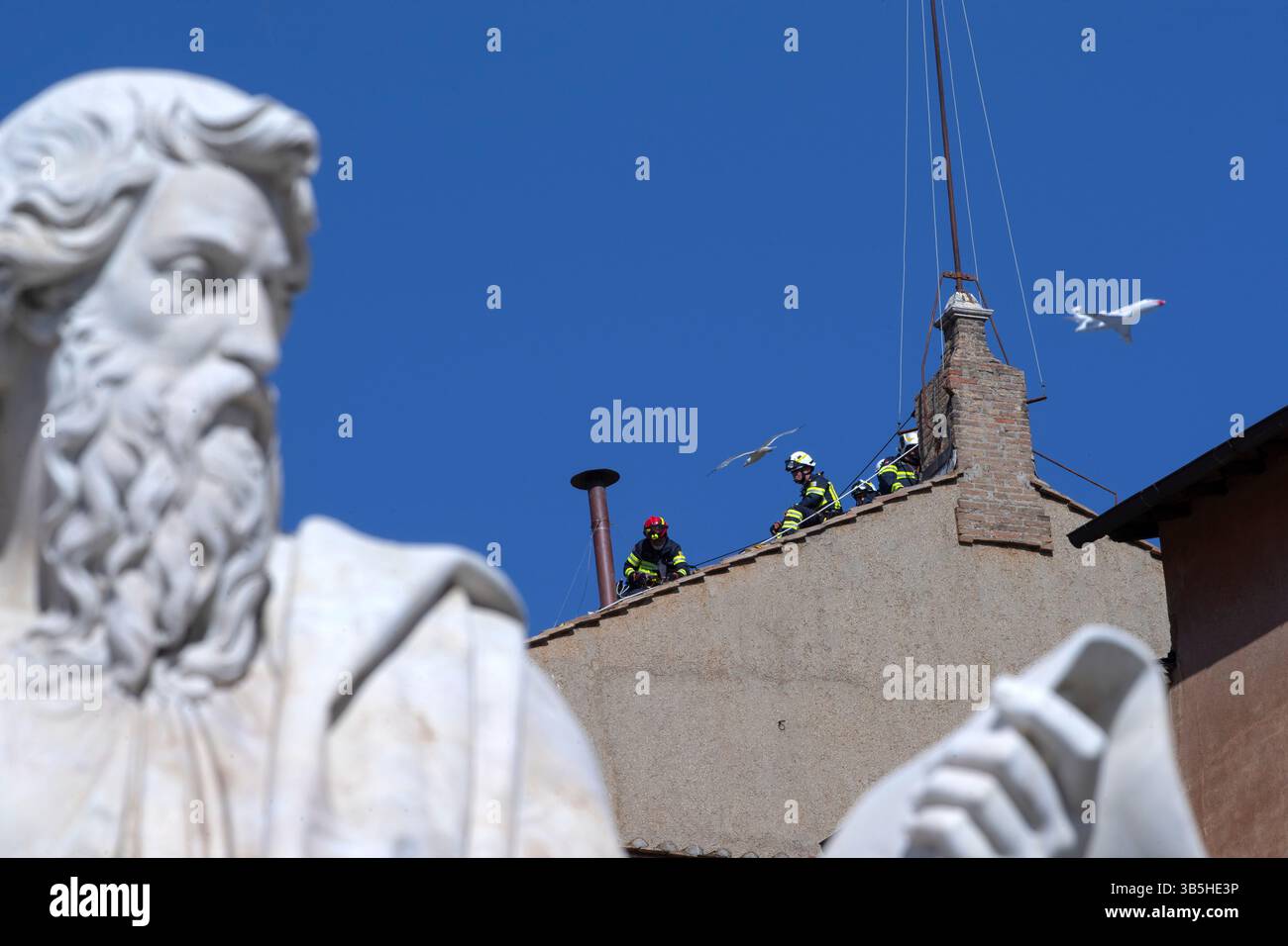 Vatican City, Vatican, 02 May 2025. Firefighters install the chimney on ...