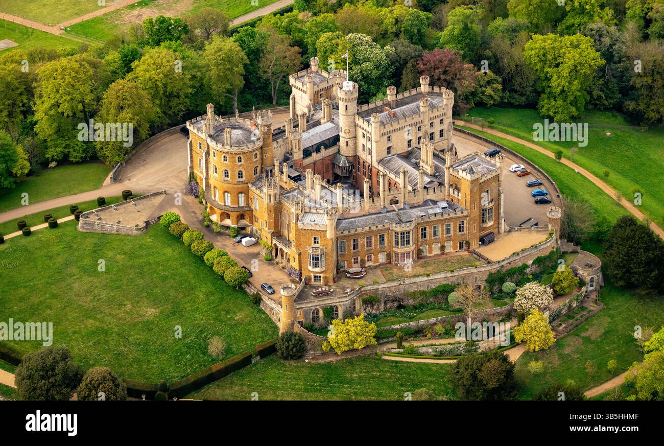 Aerial photograph of Belvoir Castle surrounded by trees in full leaf ...
