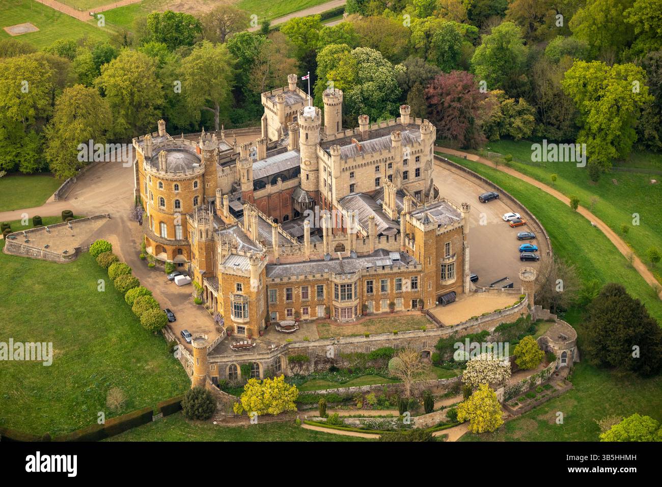 Aerial photograph of Belvoir Castle surrounded by trees in full leaf Stock Photo - Alamy