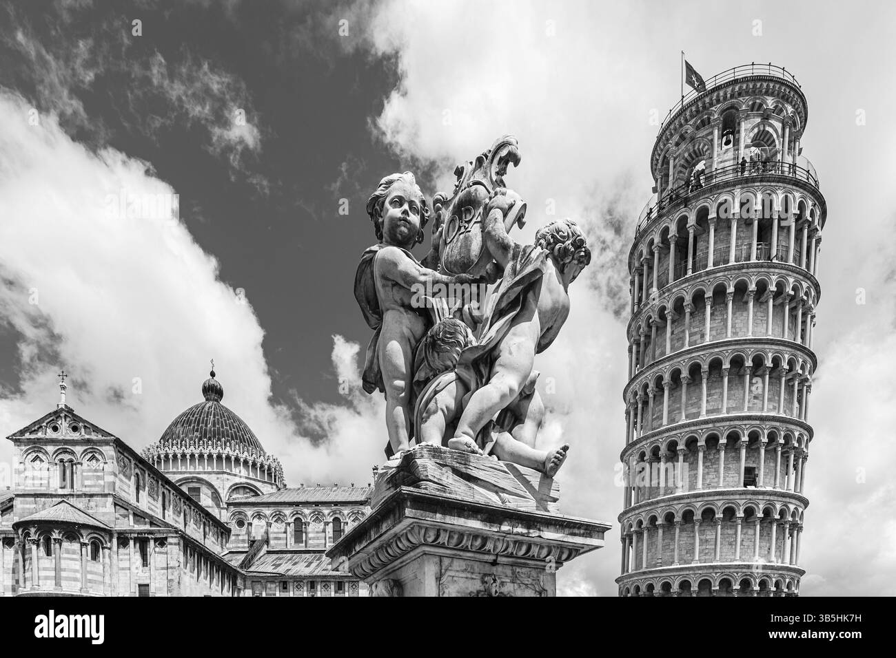 Statue with angels, behind the Cathedral of Santa Maria Assunta and the ...