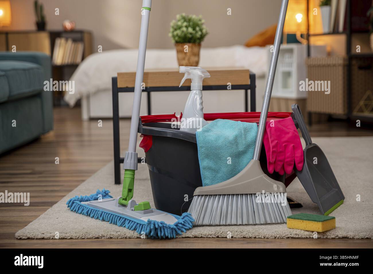 A wellorganized collection of essential cleaning tools is ready for use ...