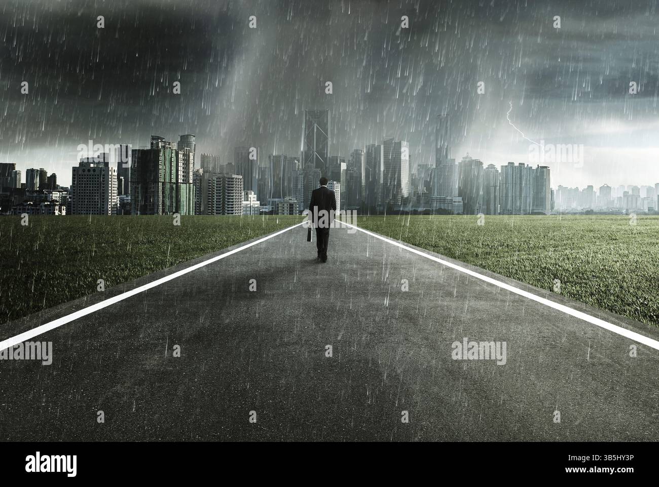 Business man facing a storm, victory concept Stock Photo - Alamy