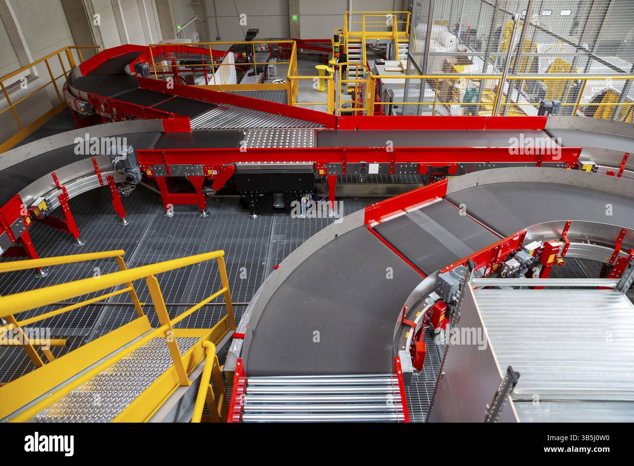 Empty conveyor sorting belt at distribution warehouse. Distribution hub ...