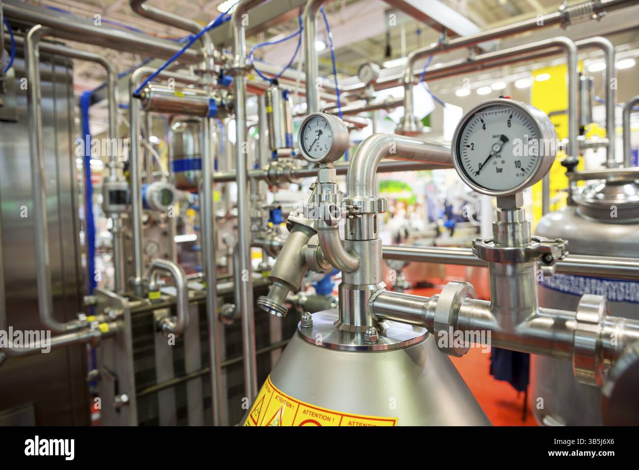 Milk pasteurization system is shown at a food and drink exhibition ...