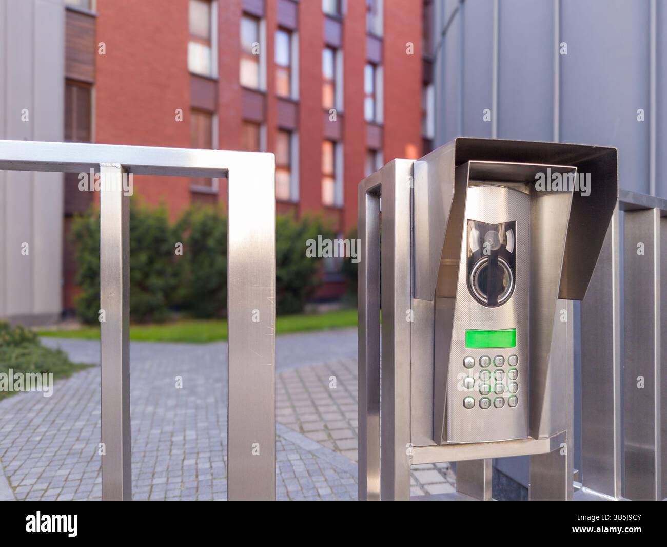 Keypad video intercom at residential gate Stock Photo - Alamy