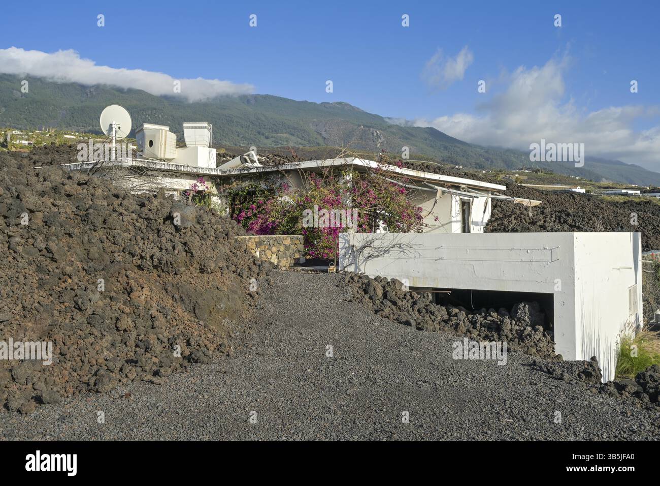 Destroyed house by the volcanic eruption of the Tajogaite volcano in ...