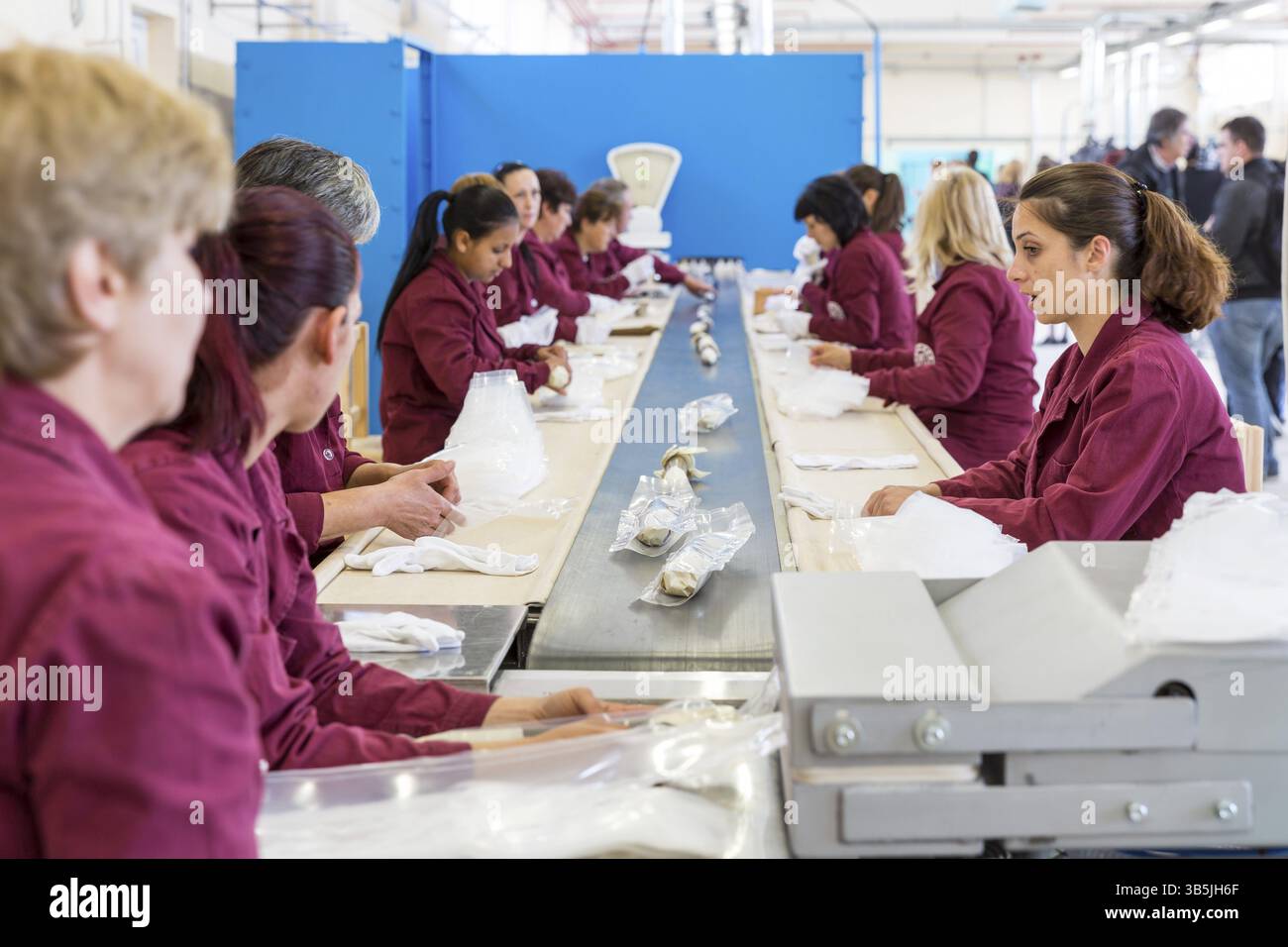 Sopot, Bulgaria - May 17, 2016: Workers are preparing explosive element ...