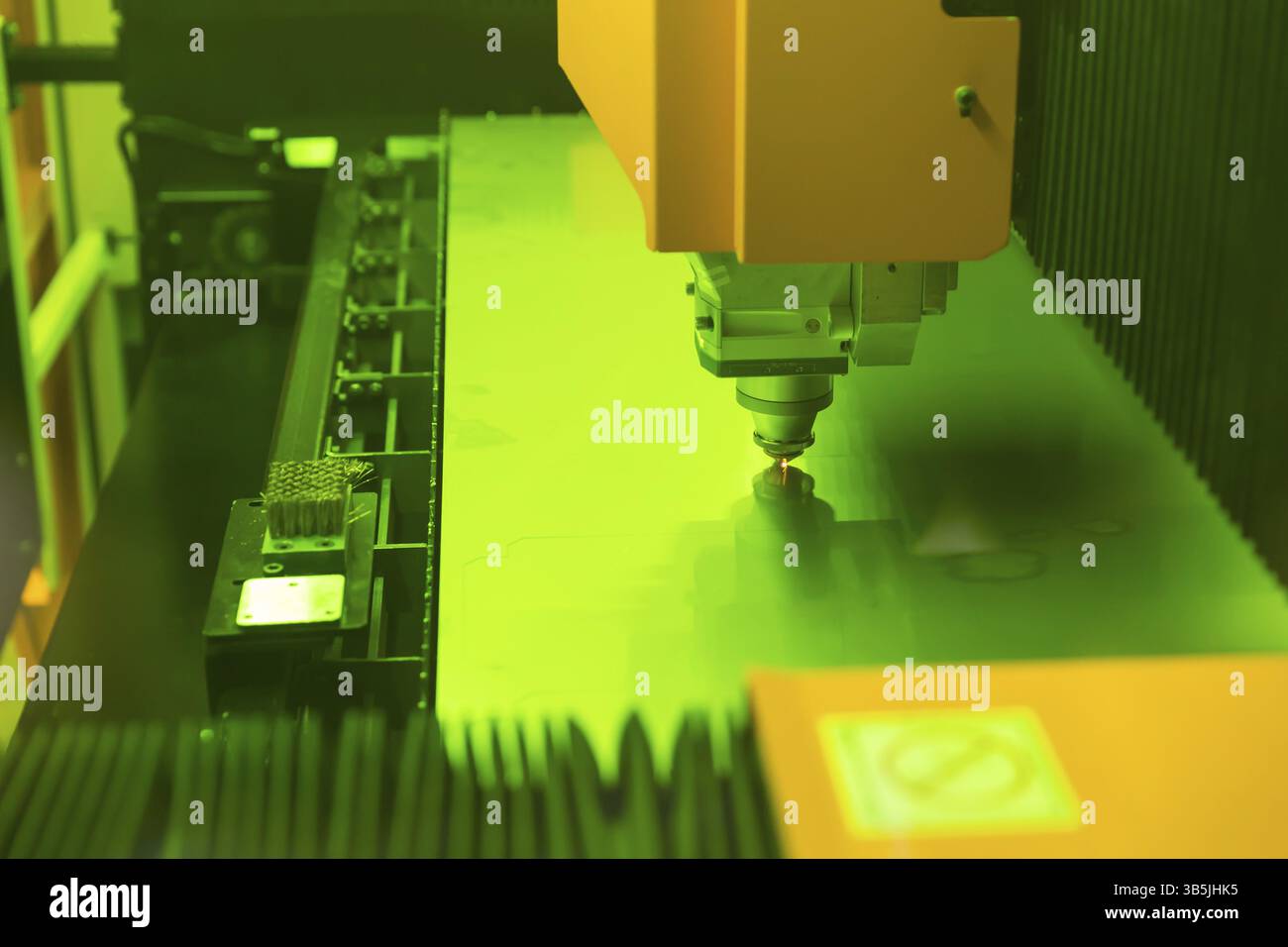 High precision CNC laser cutting elements out of a metal sheet ...