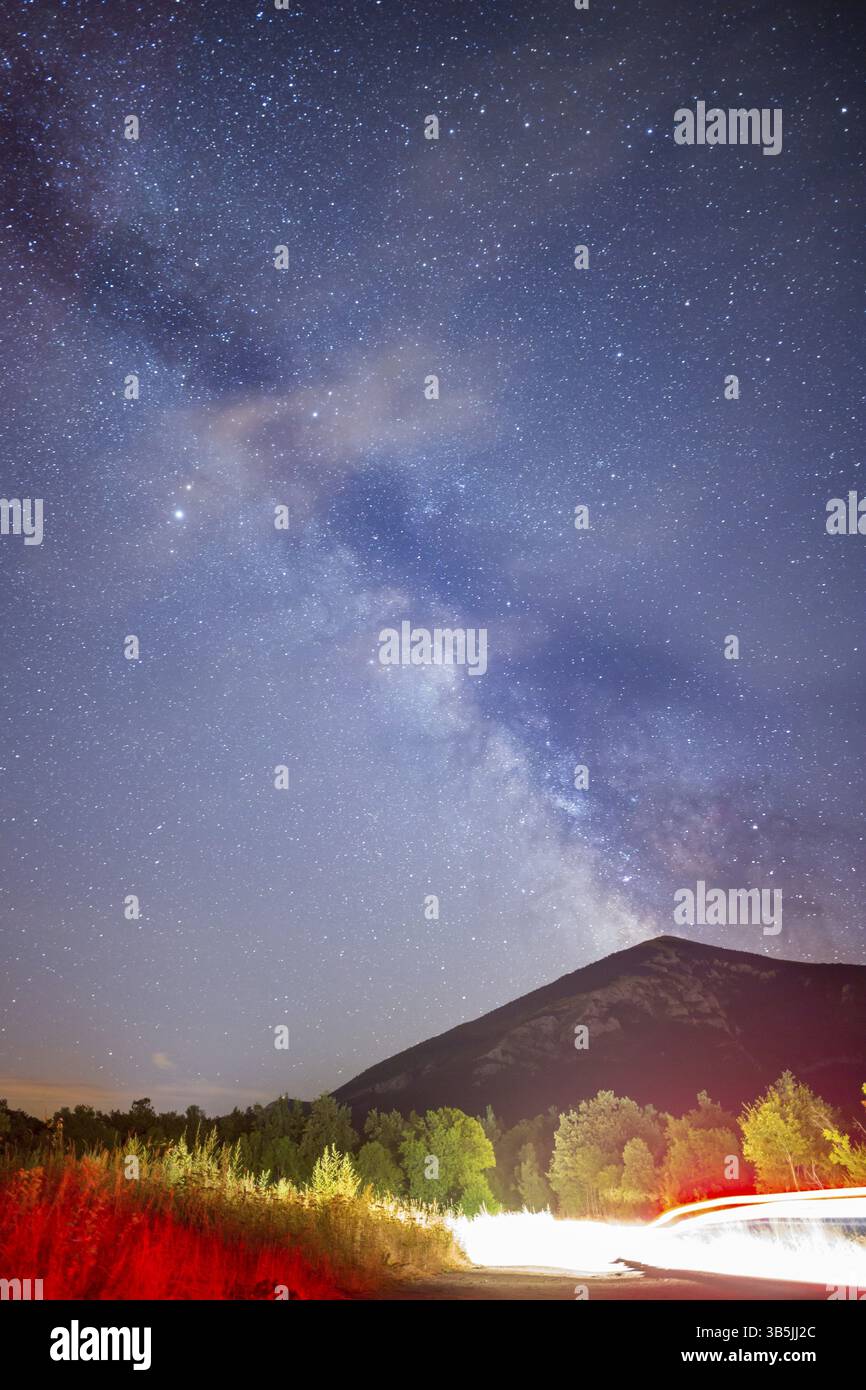 A view of the stars of the Milky Way with a mountain top in the ...