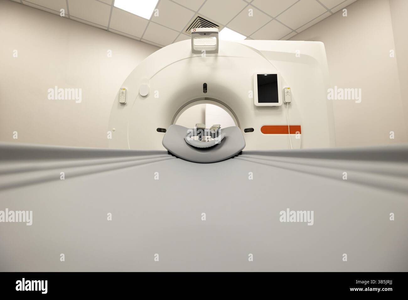 A computerised tomography (CT) scan uses X-rays and a computer to ...