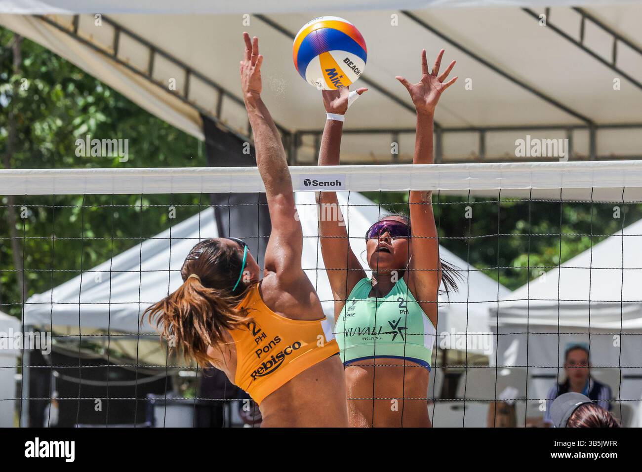 Laguna Province, Philippines. 2nd May, 2025. Bernadeth Pons (L) of the ...