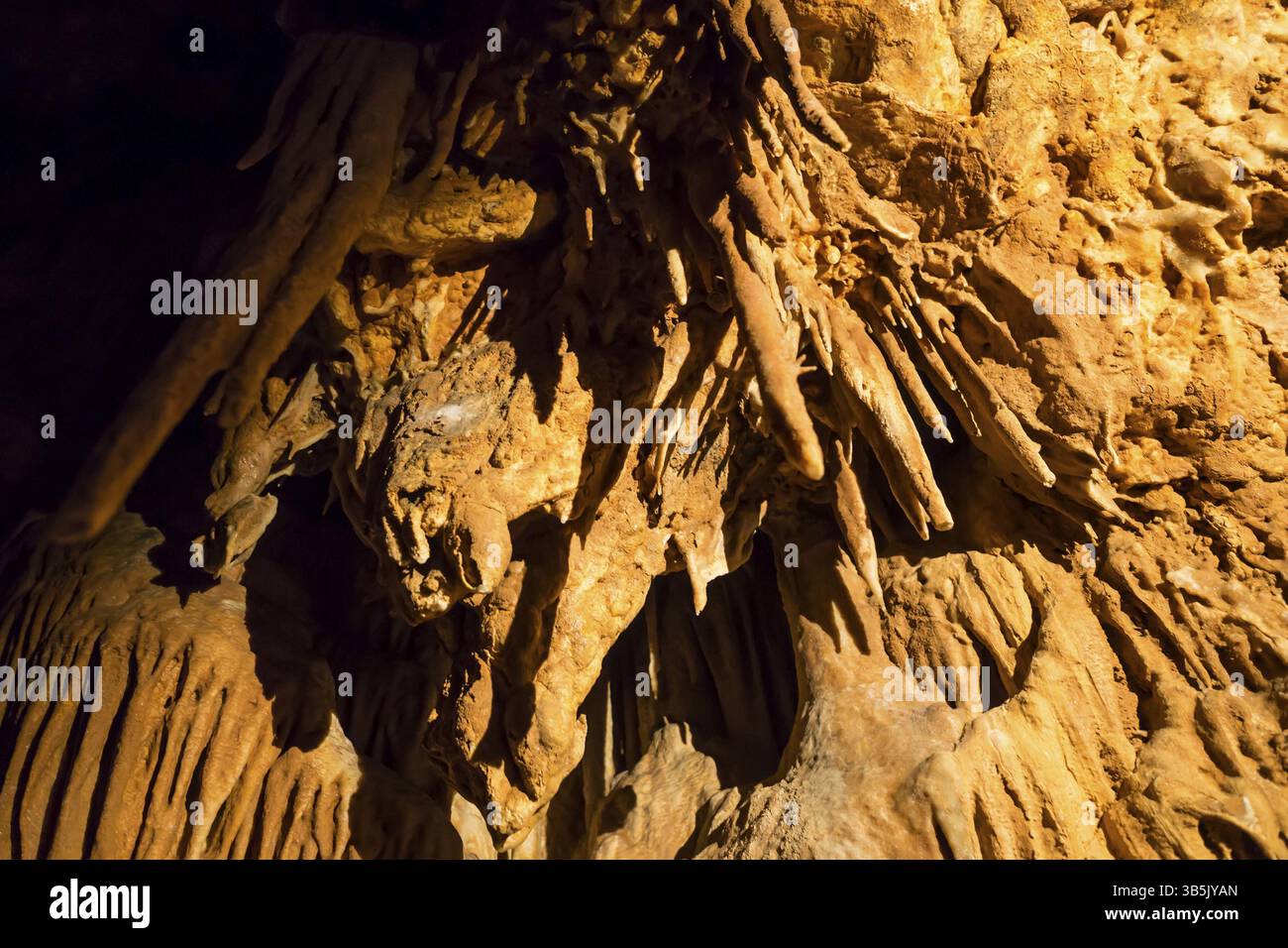 Venetsa Cave in Bulgaria. Beautiful colorful and illuminated cave full ...