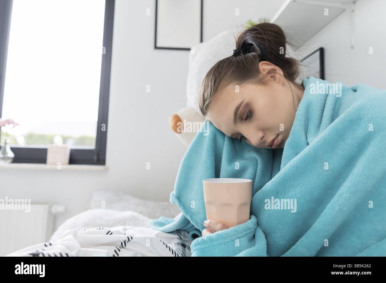 The young girl drinks a special hot infusion of herbs to return to full ...