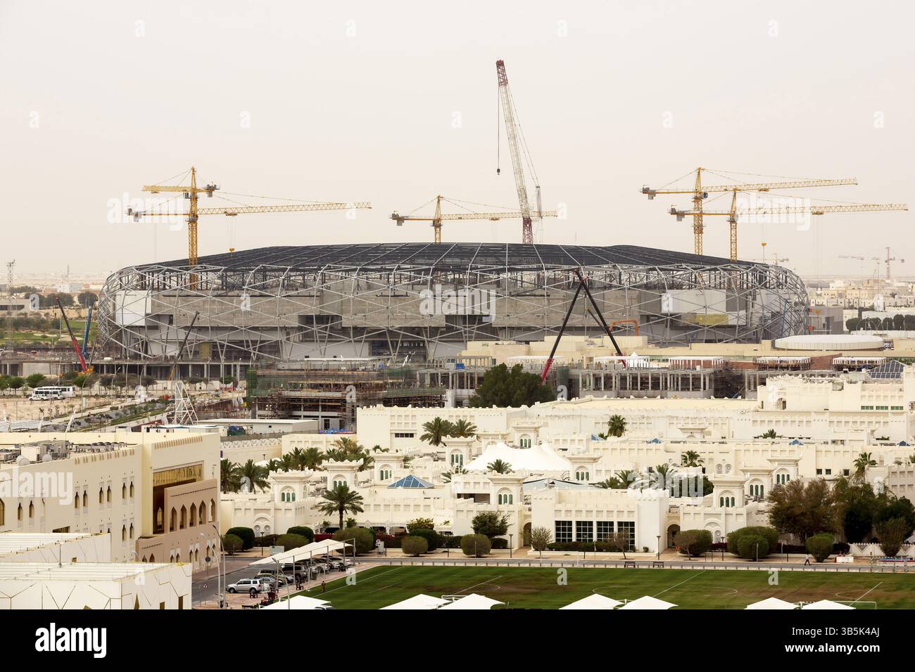 Construction site of a football stadium in Doha, Qatar. Many stadiums ...