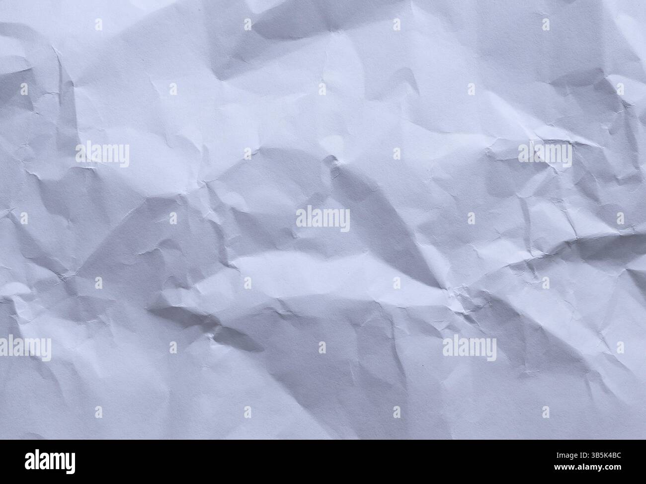 White crumpled paper texture background showing wrinkles and creases ...