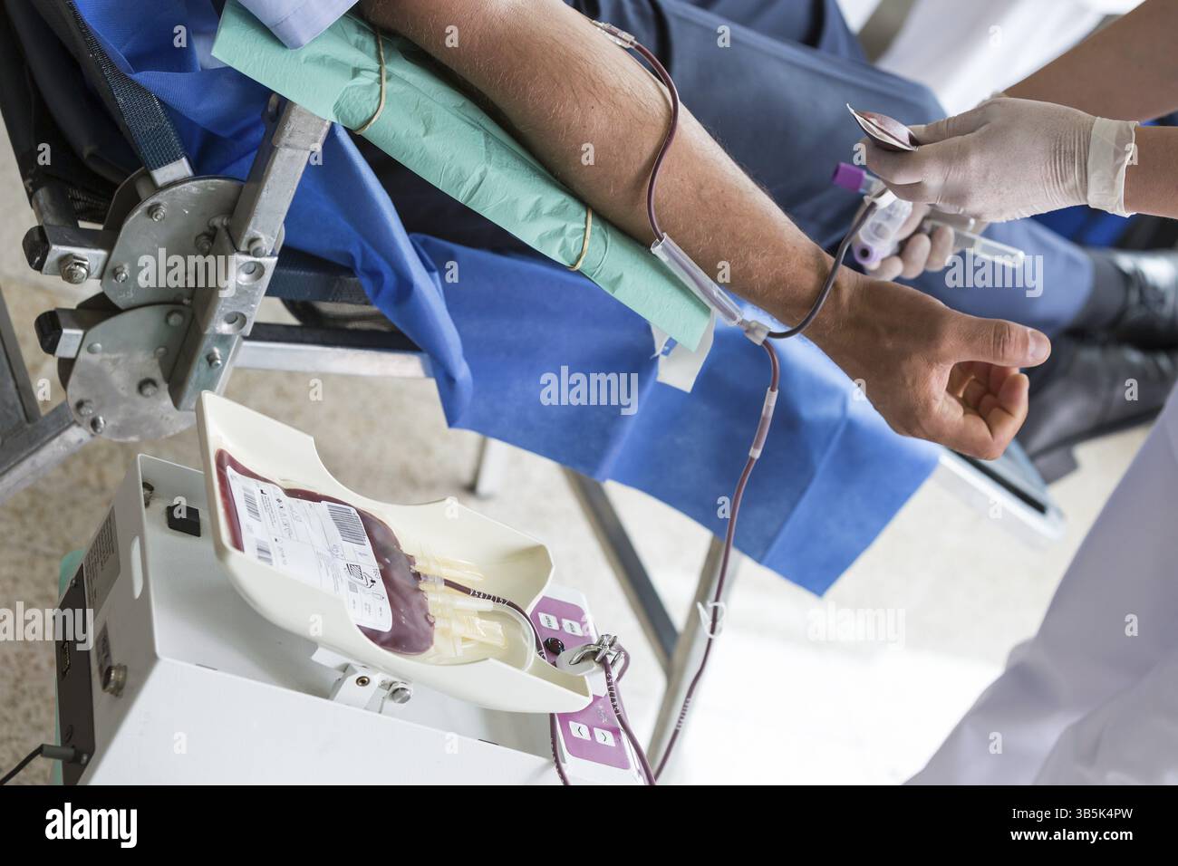 Volunteers are donating blood at the World Blood Donor Day (WBDD). The ...