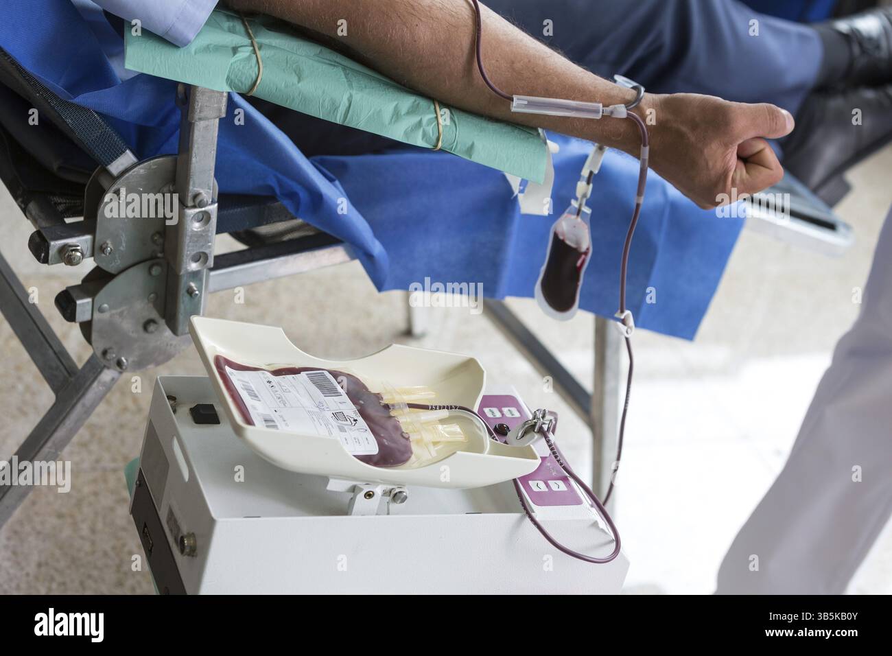Volunteers are donating blood at the World Blood Donor Day (WBDD). The ...