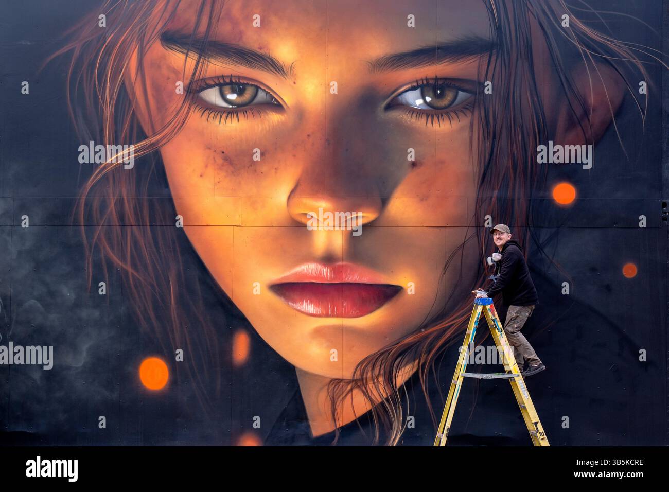 Artist 'Jeks', who has travelled from North Carolina in the United ...