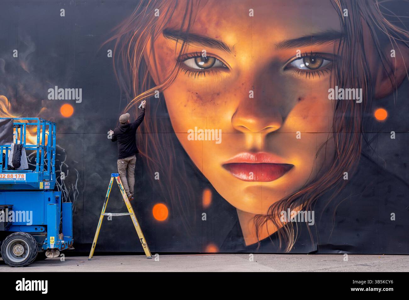 Artist 'Jeks', who has travelled from North Carolina in the United ...