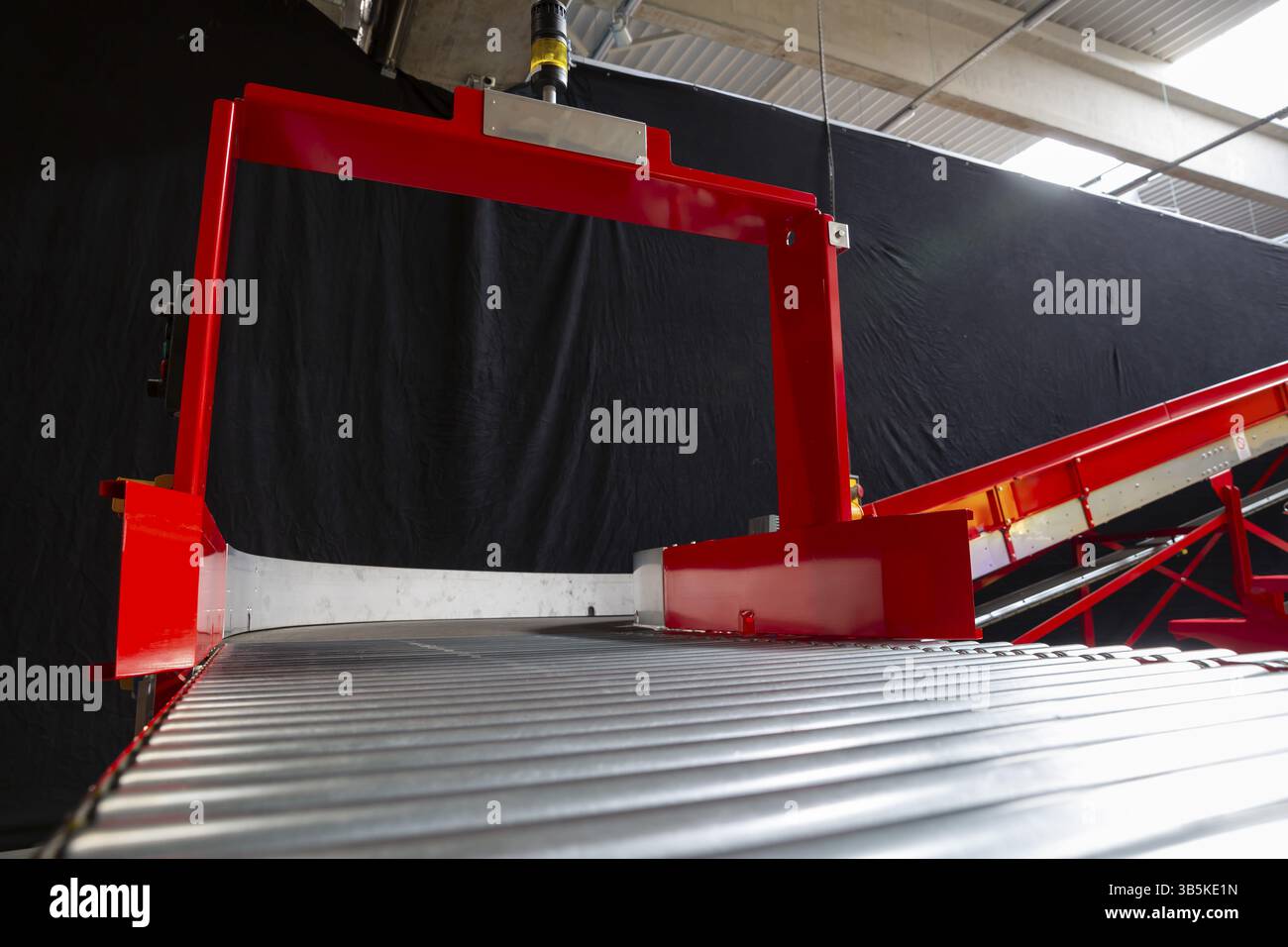 Empty conveyor sorting belt at distribution warehouse. Distribution hub ...