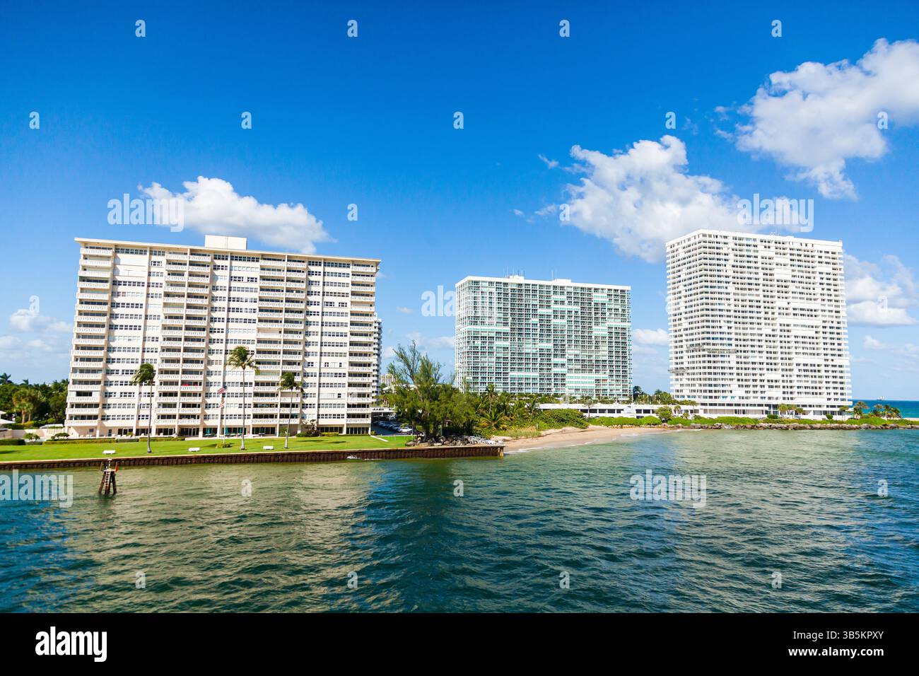 View of residential high-rise buildings with a gorgeous beach on the ...
