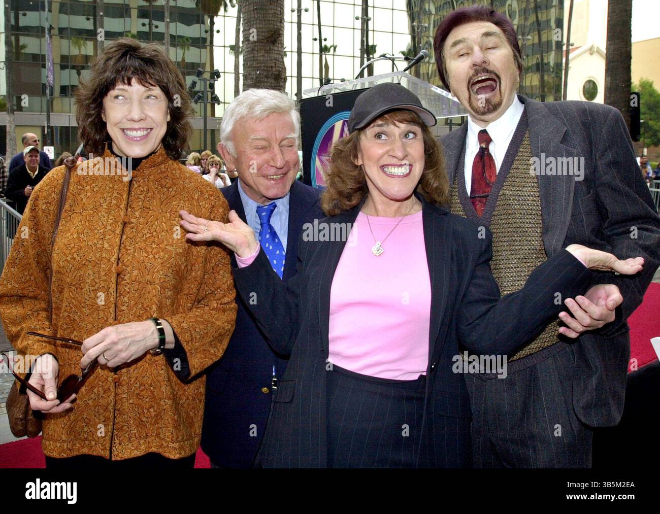 FILE - "Rowan & Martin's Laugh-In" cast members, from left, Lily Tomlin ...
