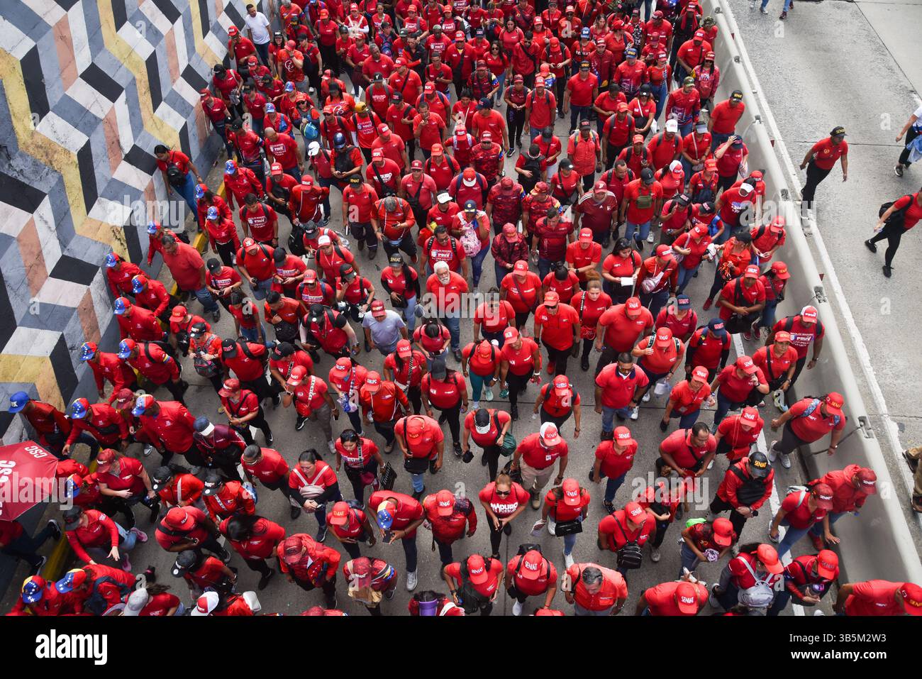 Caracas, Venezuela. 1st May, 2025. People participate in an ...