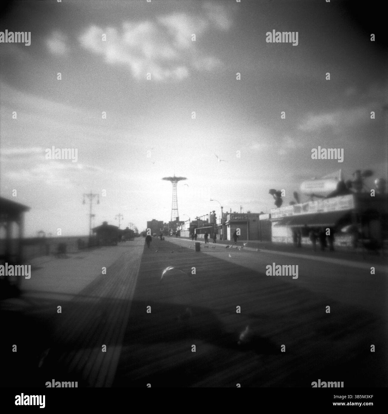 Old Fashioned black and white image of the Coney Island boardwalk ...