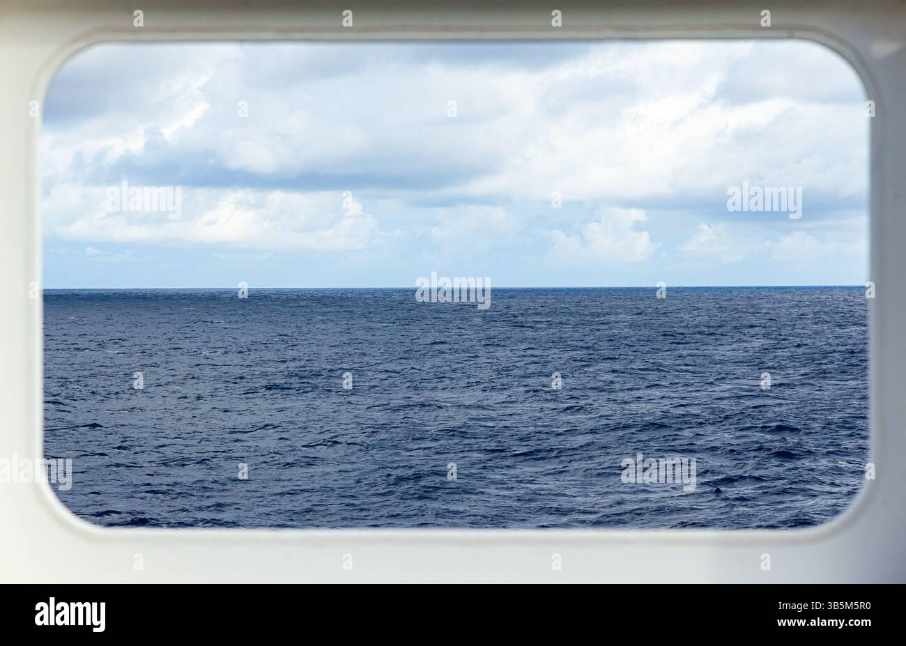 Porthole on a ship overlooking the sea and sky Stock Photo - Alamy
