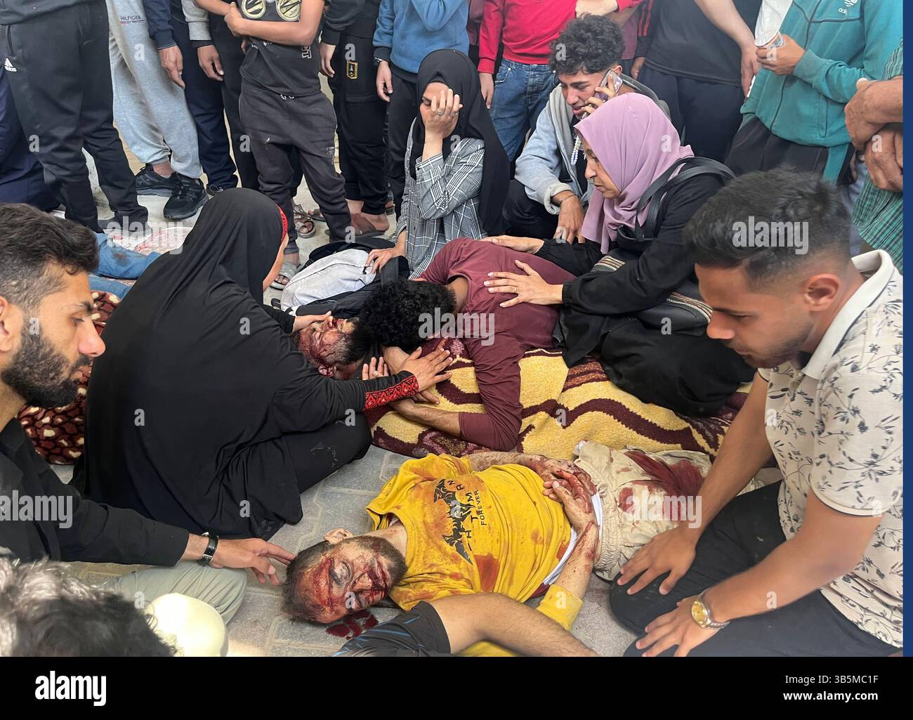 Bodies of Palestinians, who died in Israeli attacks on Gaza City, are ...