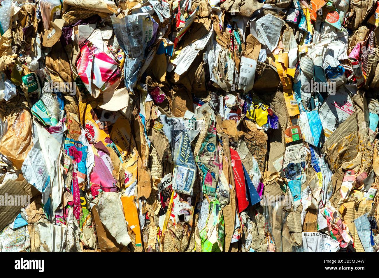 Compressed waste materials stacked together illustrate the recycling ...