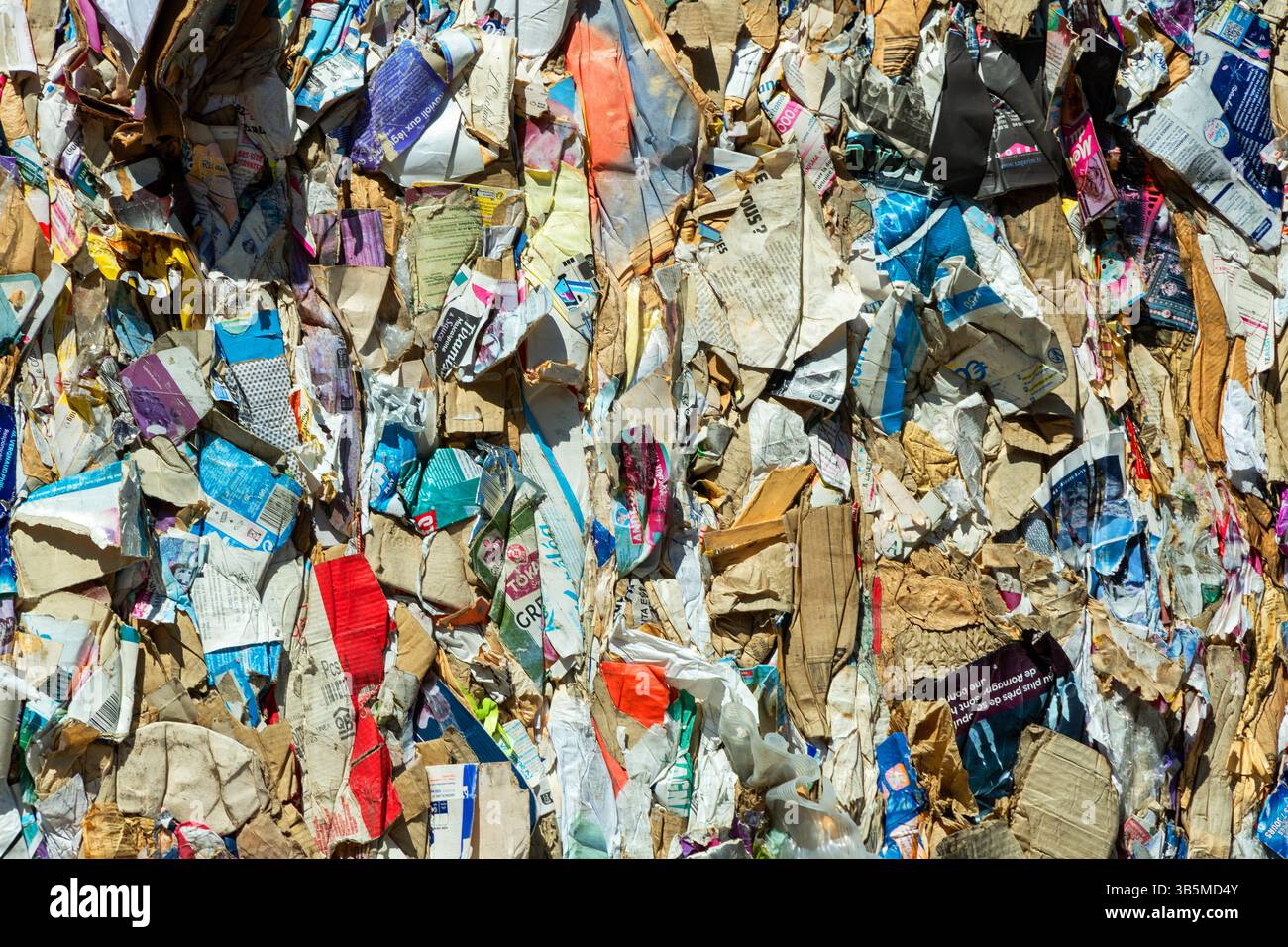 Compressed waste materials stacked together illustrate the recycling ...