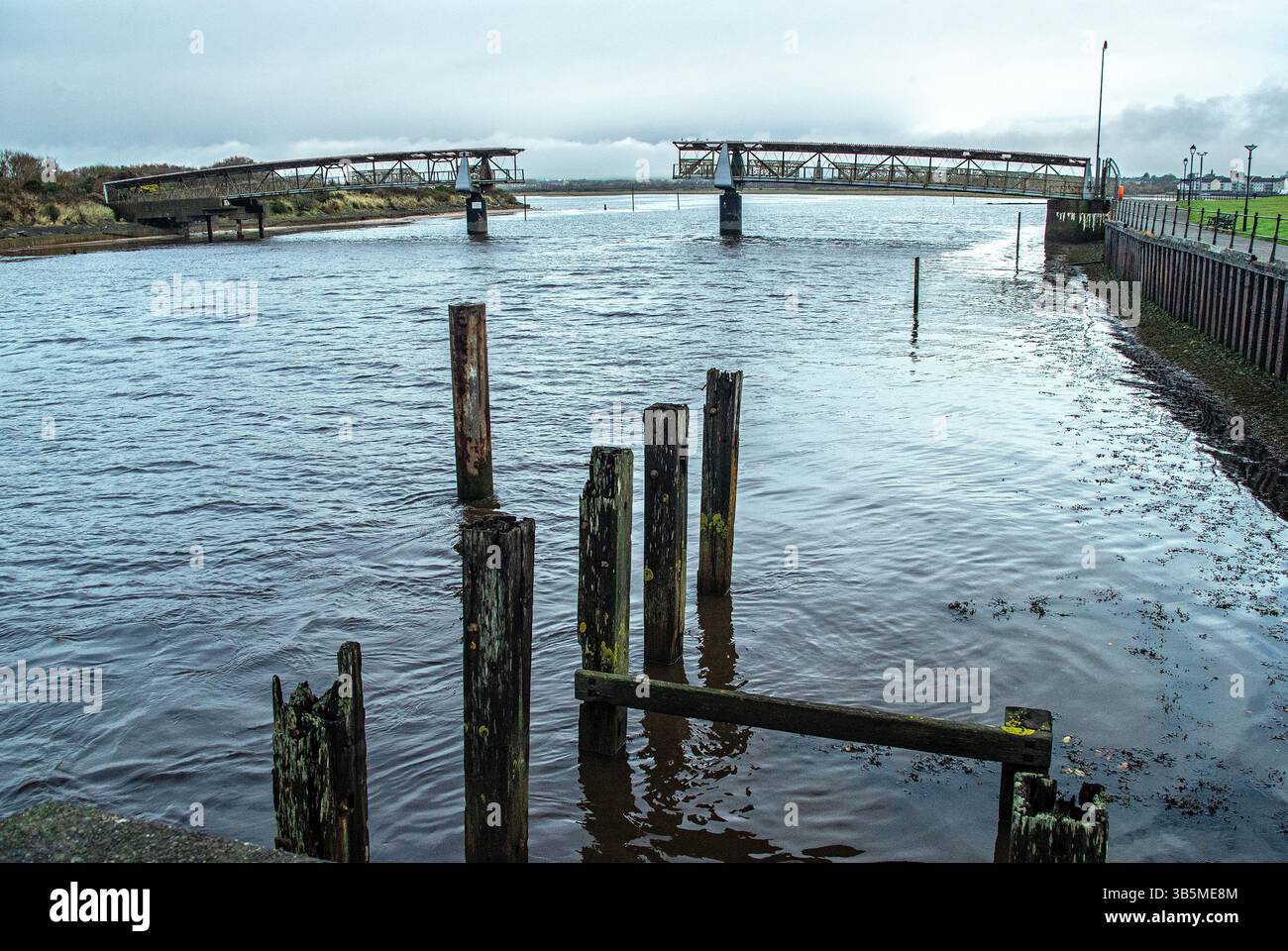 The broken bridge over the river Irvine that led to the millenium ...