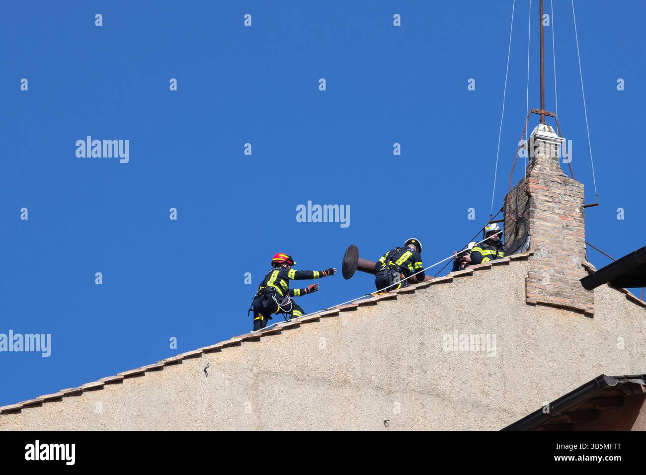 Vatican, Vatican. 02nd May, 2025. Firefighters install the chimney on ...
