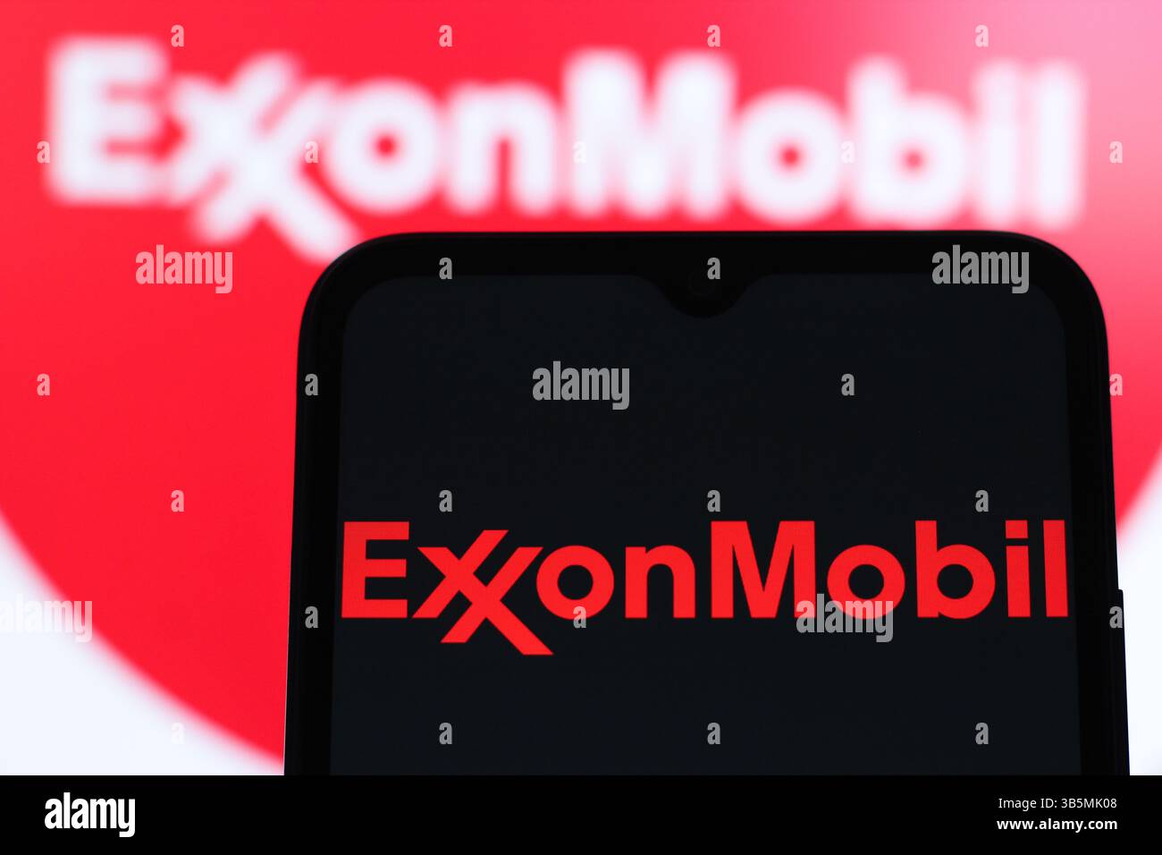 In this photo illustration, the Exxon Mobil Corporation logo is seen ...
