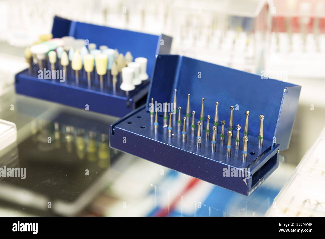 Dental instruments for stomatology practice. Blue box Stock Photo - Alamy