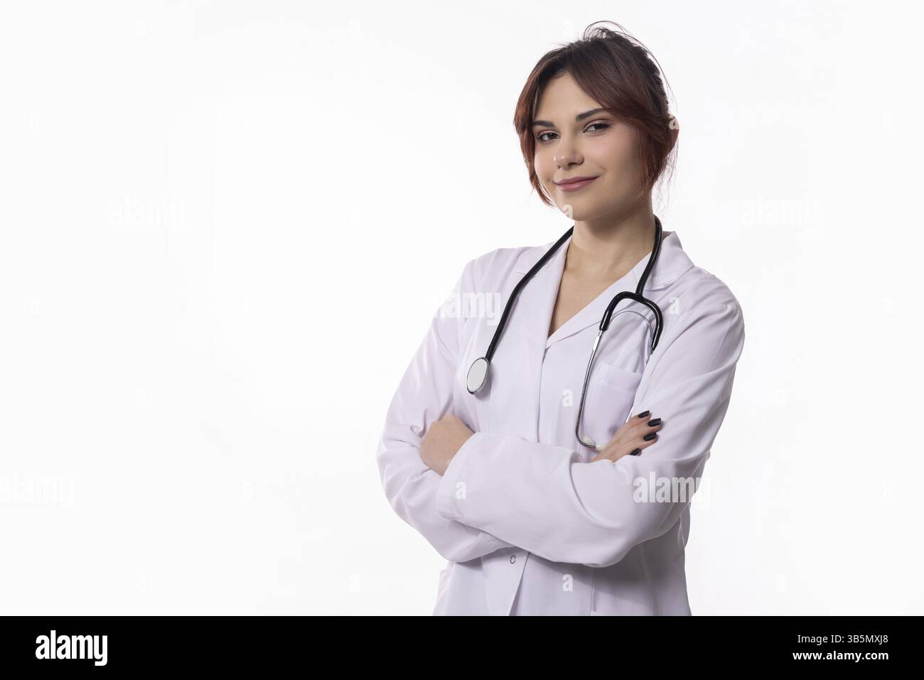 Confident female doctor poses hi-res stock photography and images - Alamy