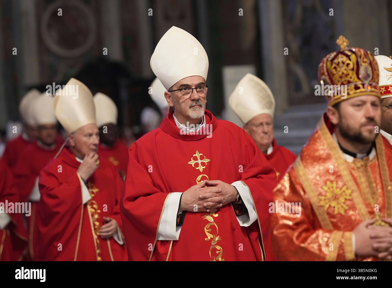 Cardinal Pierbattista Pizzaballa arrives in procession for a mass on ...
