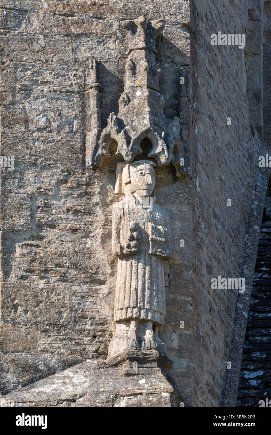 Carved statue on St Stephen's Church, Clanfield, Oxfordshire, UK Stock ...