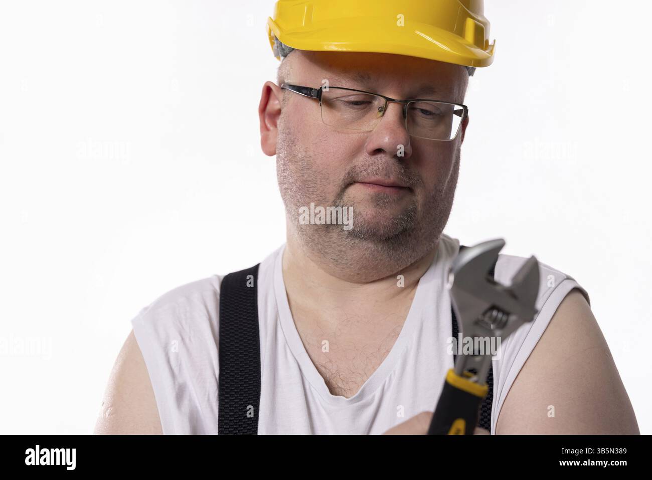 Focused construction diligent worker hi-res stock photography and ...